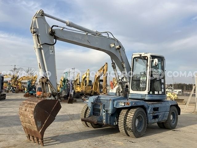 Máy xúc bánh lốp KOMATSU PW128UU-1S - CoMacPro | CoMacPro